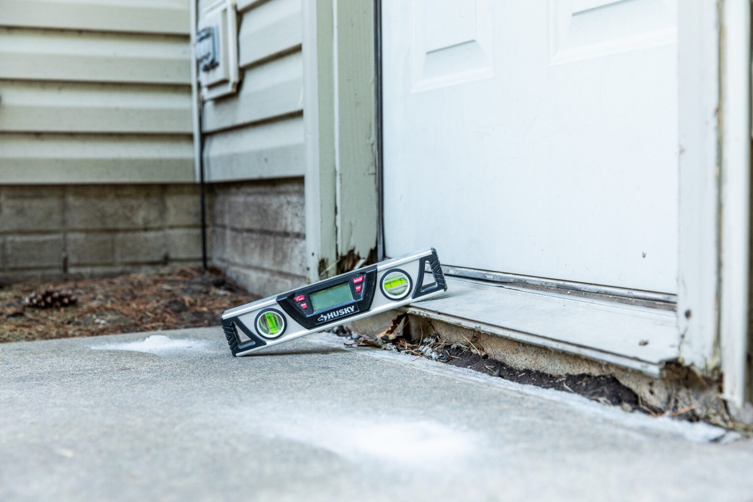 Concrete Repair for Sunken Garage Floor by Side Door | TerraFirma